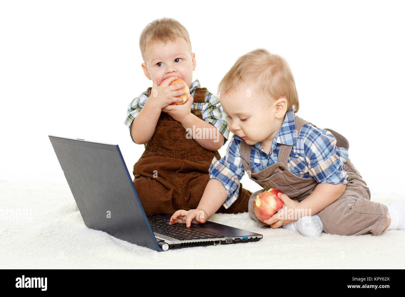 Small children with notebook Stock Photo - Alamy