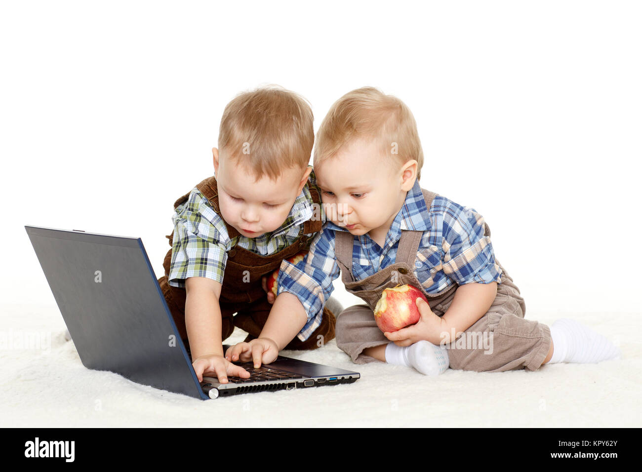 Small children with notebook Stock Photo - Alamy