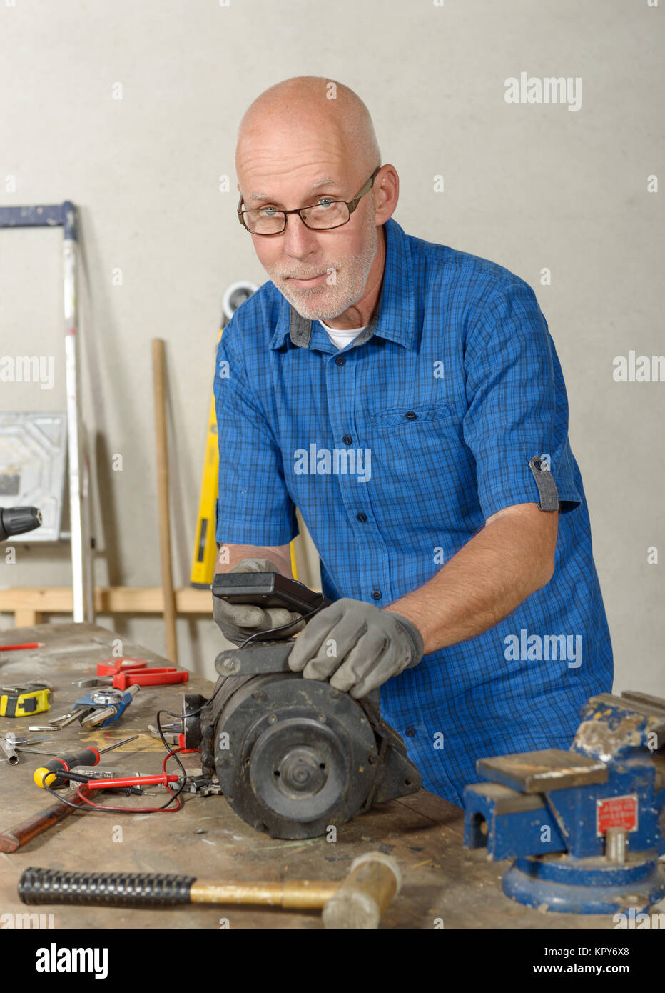 man with antique generator for the car Stock Photo - Alamy