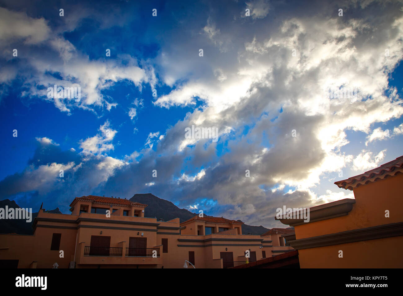 Tropical town and cloudy sky . Nature. Landscape Stock Photo - Alamy