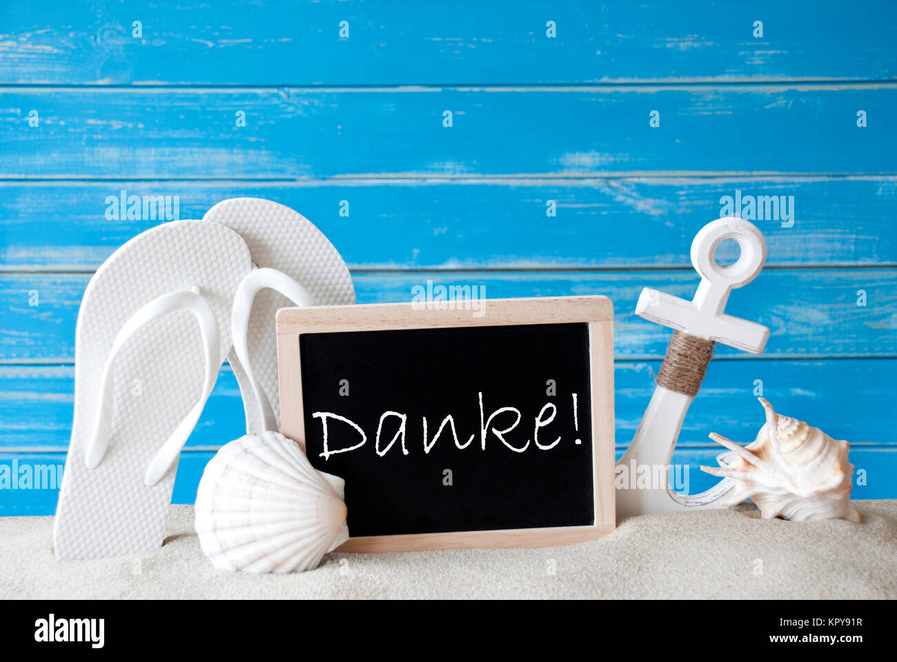 Chalkboard With German Text Danke Means Thank You. Blue Wooden ...