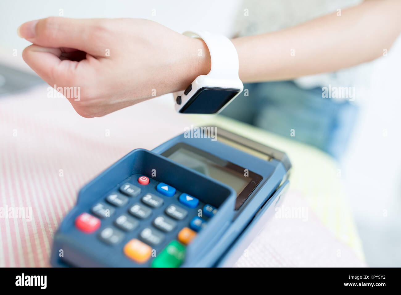 Female pay smart watch hi-res stock photography and images - Alamy