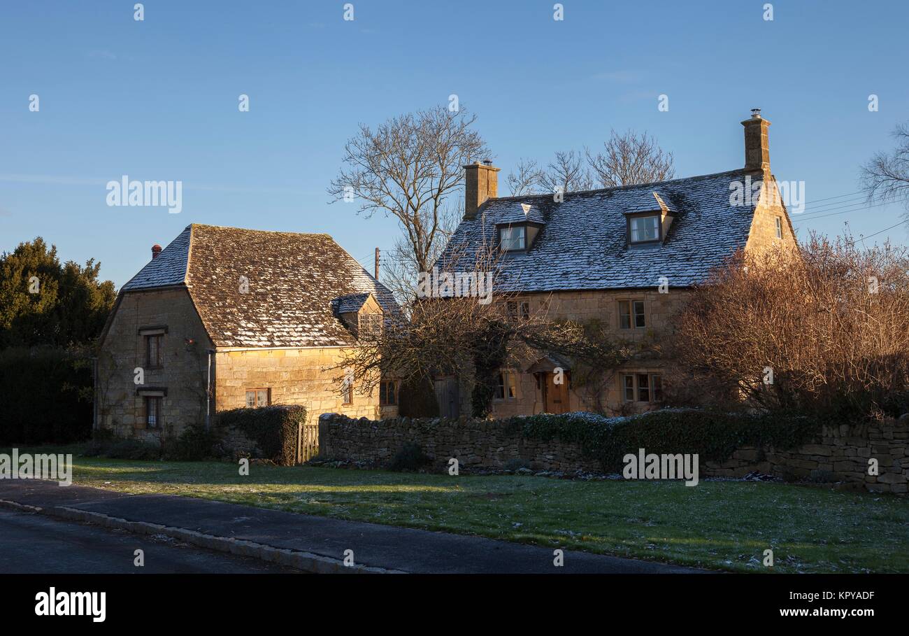 Cotswold country cottage with light snow Stock Photo - Alamy