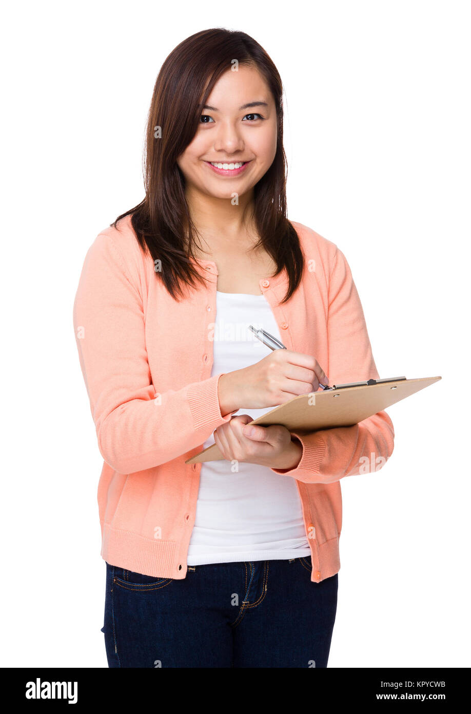 Young woman write on clipboard Stock Photo - Alamy