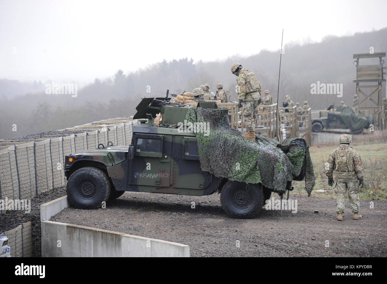 U.S. Soldiers assigned to 16th Sustainment Brigade, conduct a live-fire ...