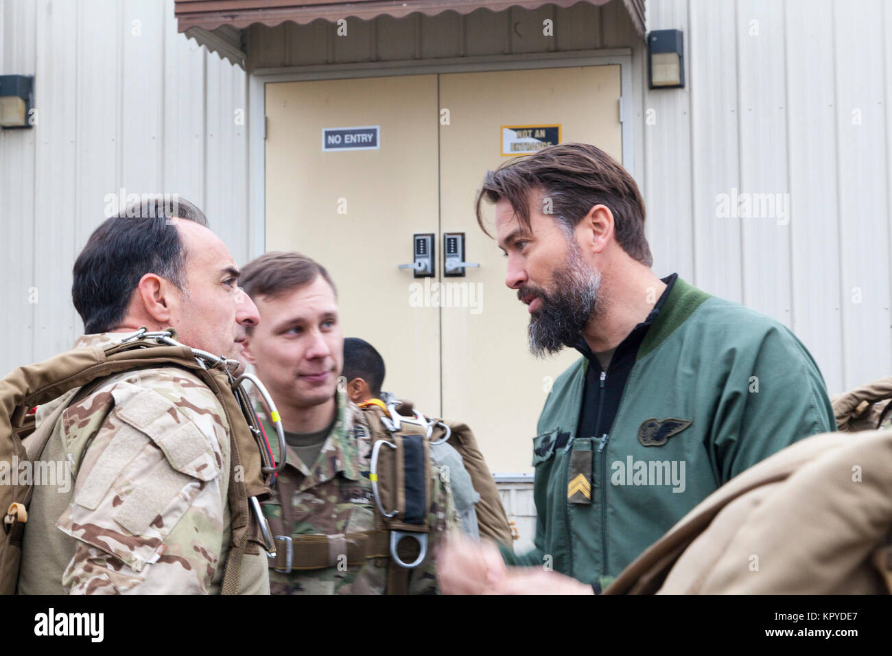 A Dutch jumpmaster speaks with U.S. Army paratroopers during the 20th ...