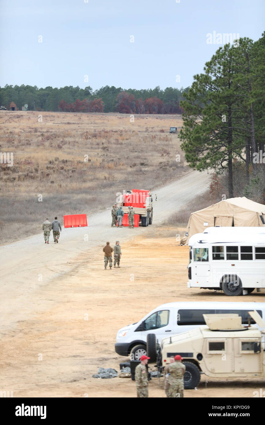 A U.S. Army Soldiers pack up barriers from Luzon Drop Zone after the ...