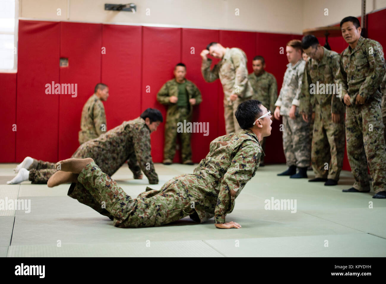 Japan Ground Self-Defense Force members complete a conditioning drill ...