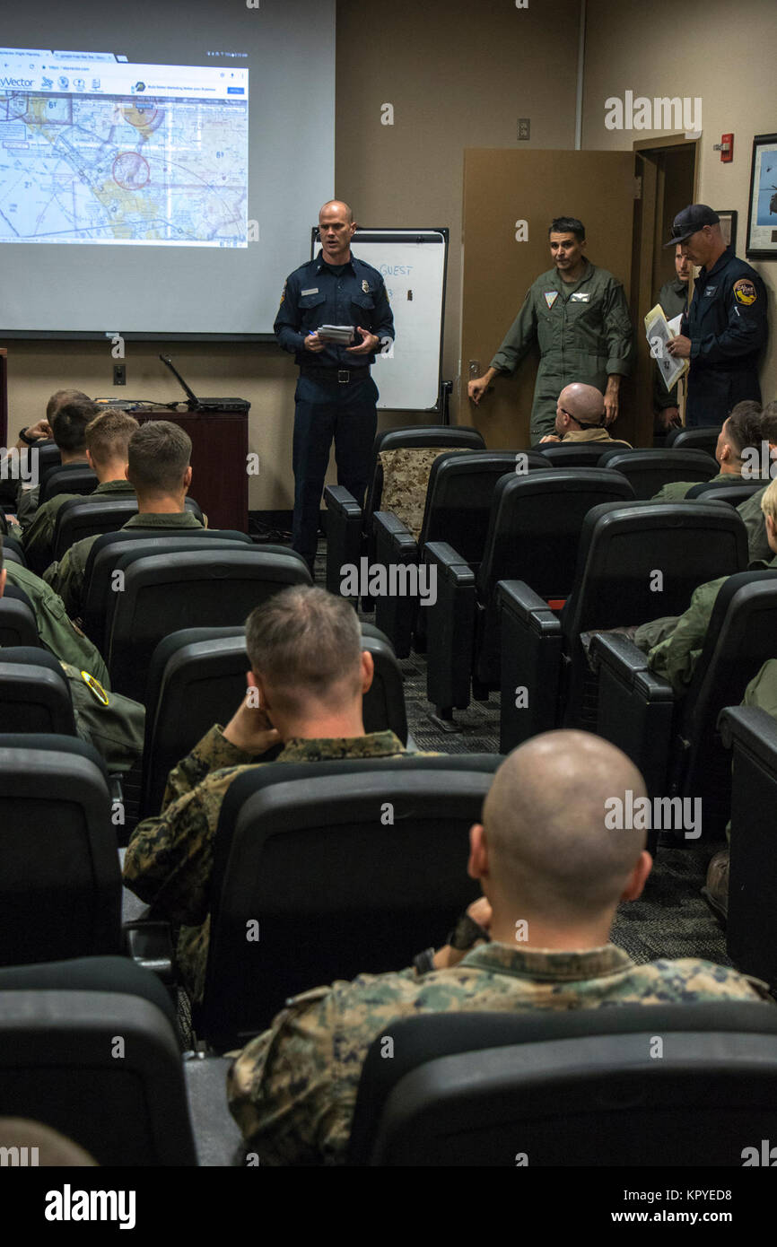 Cal Fire officer Brad Loven briefs Marine Light Attack Helicopter ...