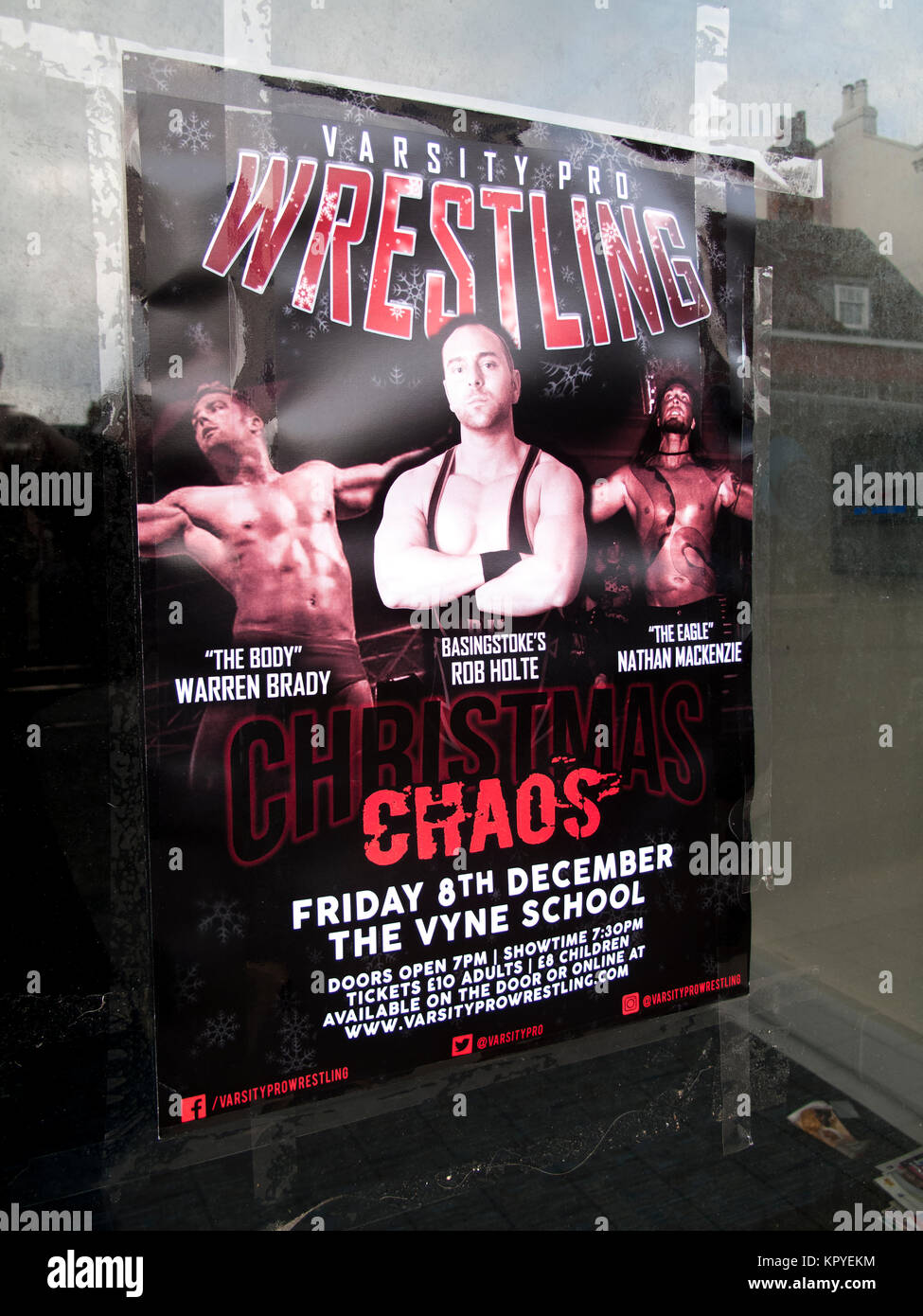 Varsity Pro Wrestling advertising poster taped to vacant shop window ...