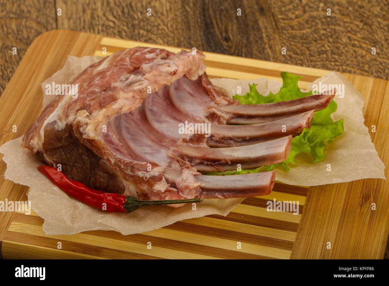 Raw lamb ribs with pepper ready for cooking Stock Photo - Alamy