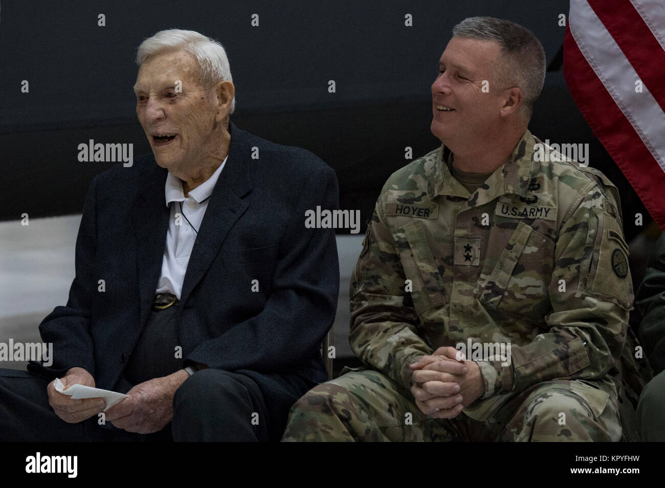 Retired U.S. Air Force Brig. Gen. J. Kemp McLaughlin (left) laughs with ...
