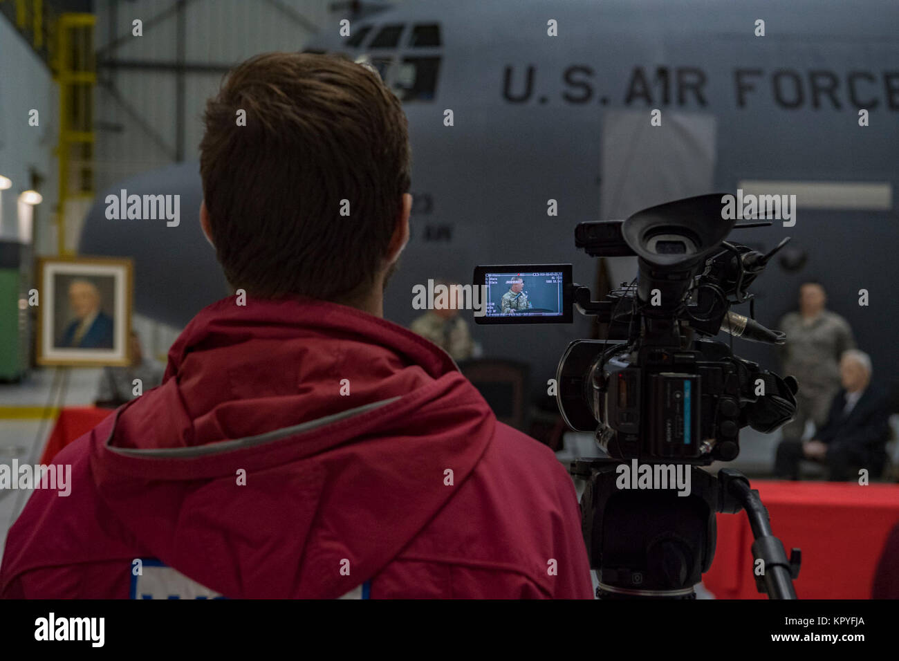 A local news reporter records a speech given by U.S. Army Maj. Gen ...