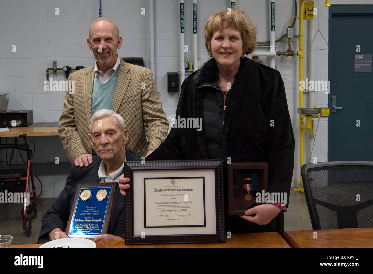 Retired U.S. Air Force Brig. Gen. J. Kemp McLaughlin poses with his son ...