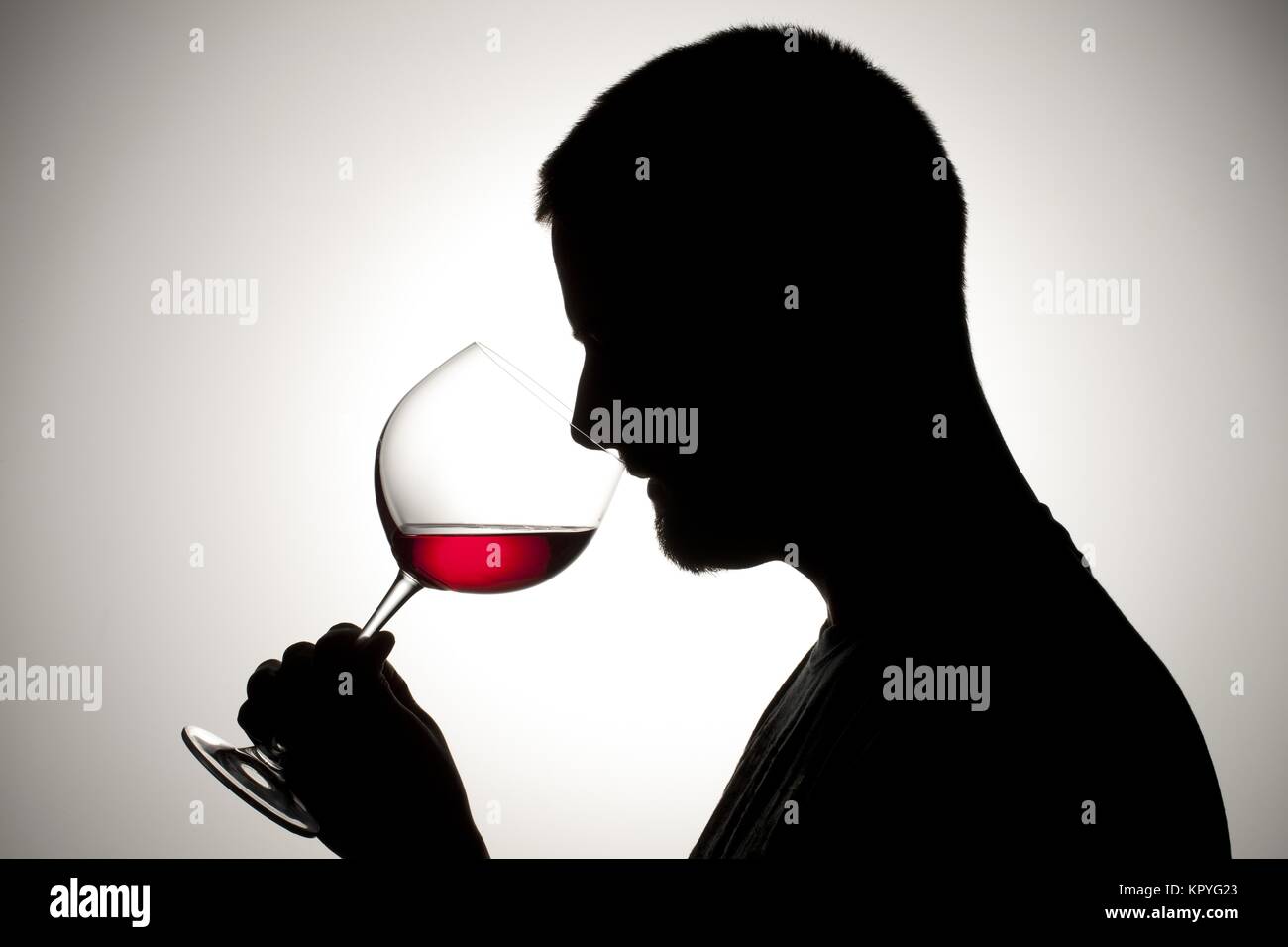 man drinking red wine Stock Photo - Alamy