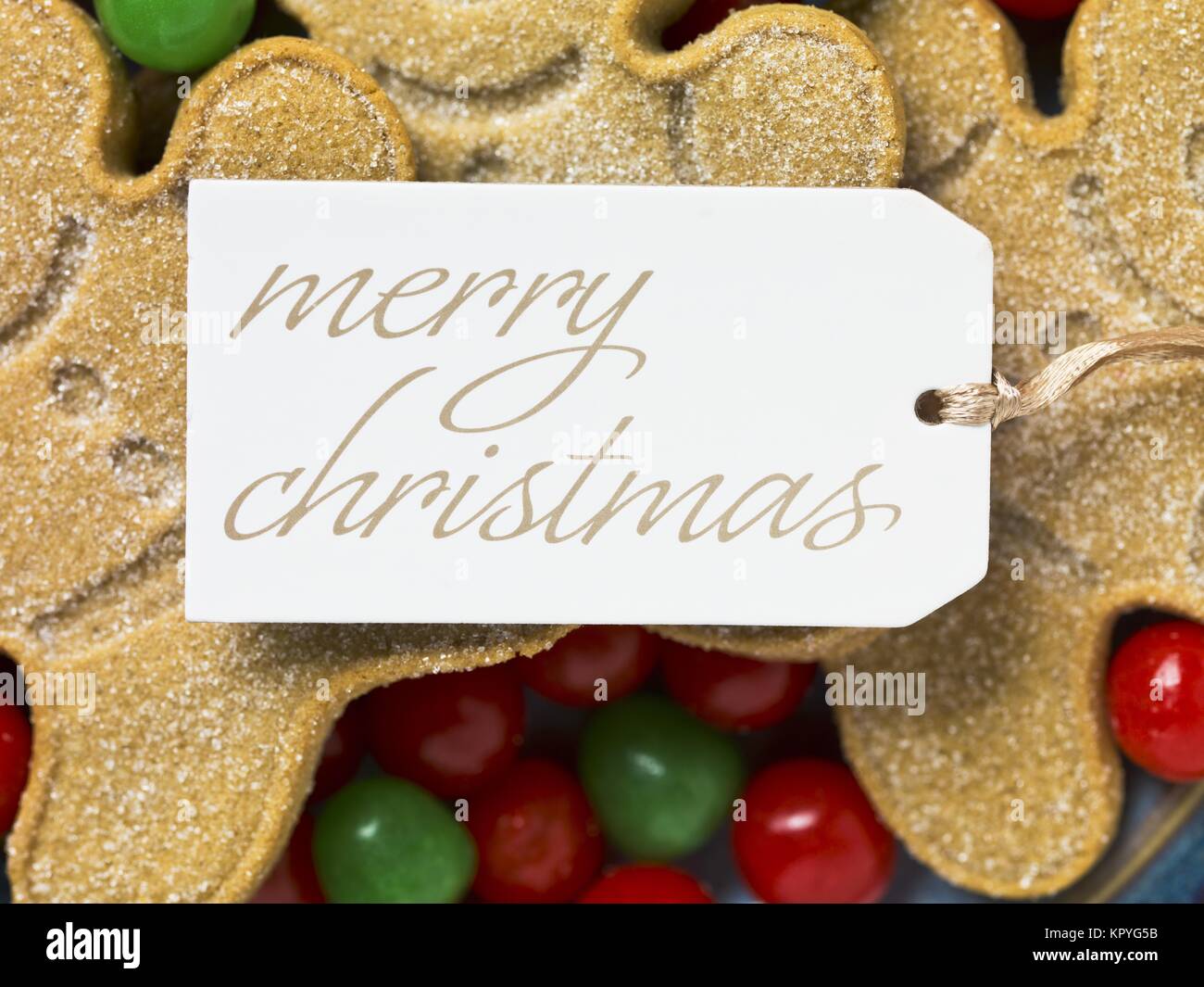 merry christmas tag with gingerbread cookies and candies Stock Photo ...