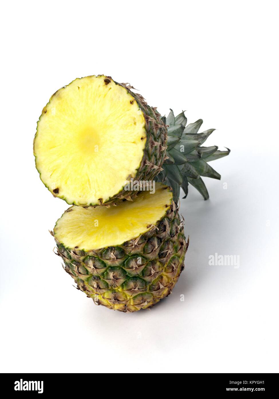 Pinapple cut in half Stock Photo - Alamy