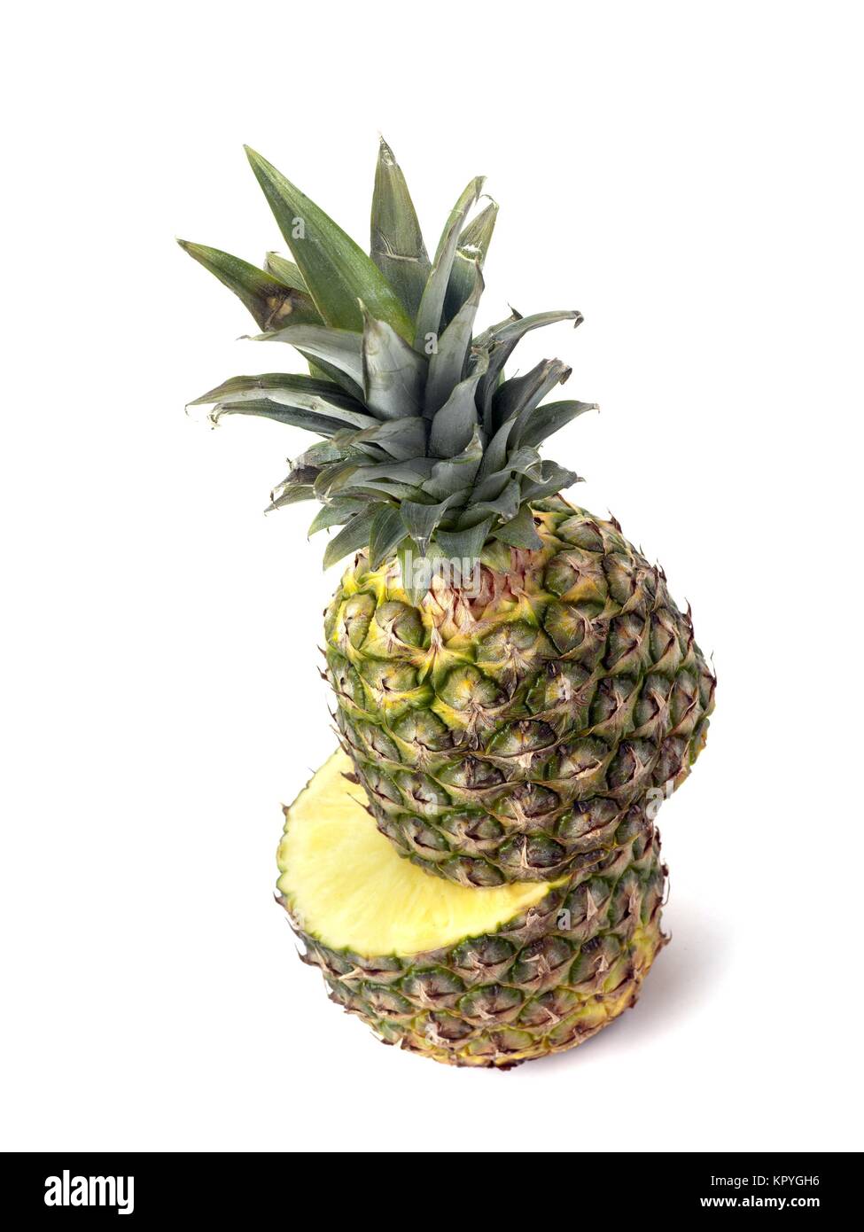 pineapple cut in half Stock Photo - Alamy