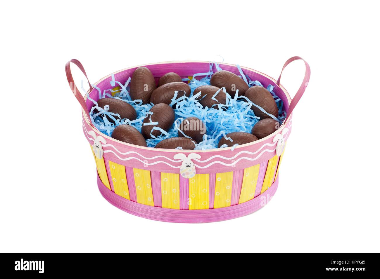 pink basket with chocolates and confetti Stock Photo - Alamy