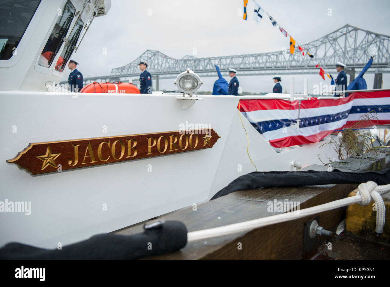 Coast Guard Cutter Jacob Poroo's crew prepares to man the rails during ...