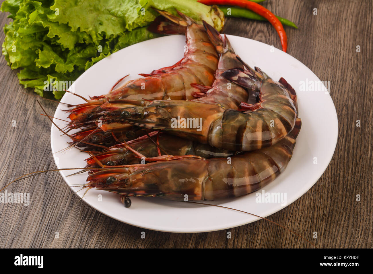Raw big tiger prawn - ready for cooking Stock Photo - Alamy