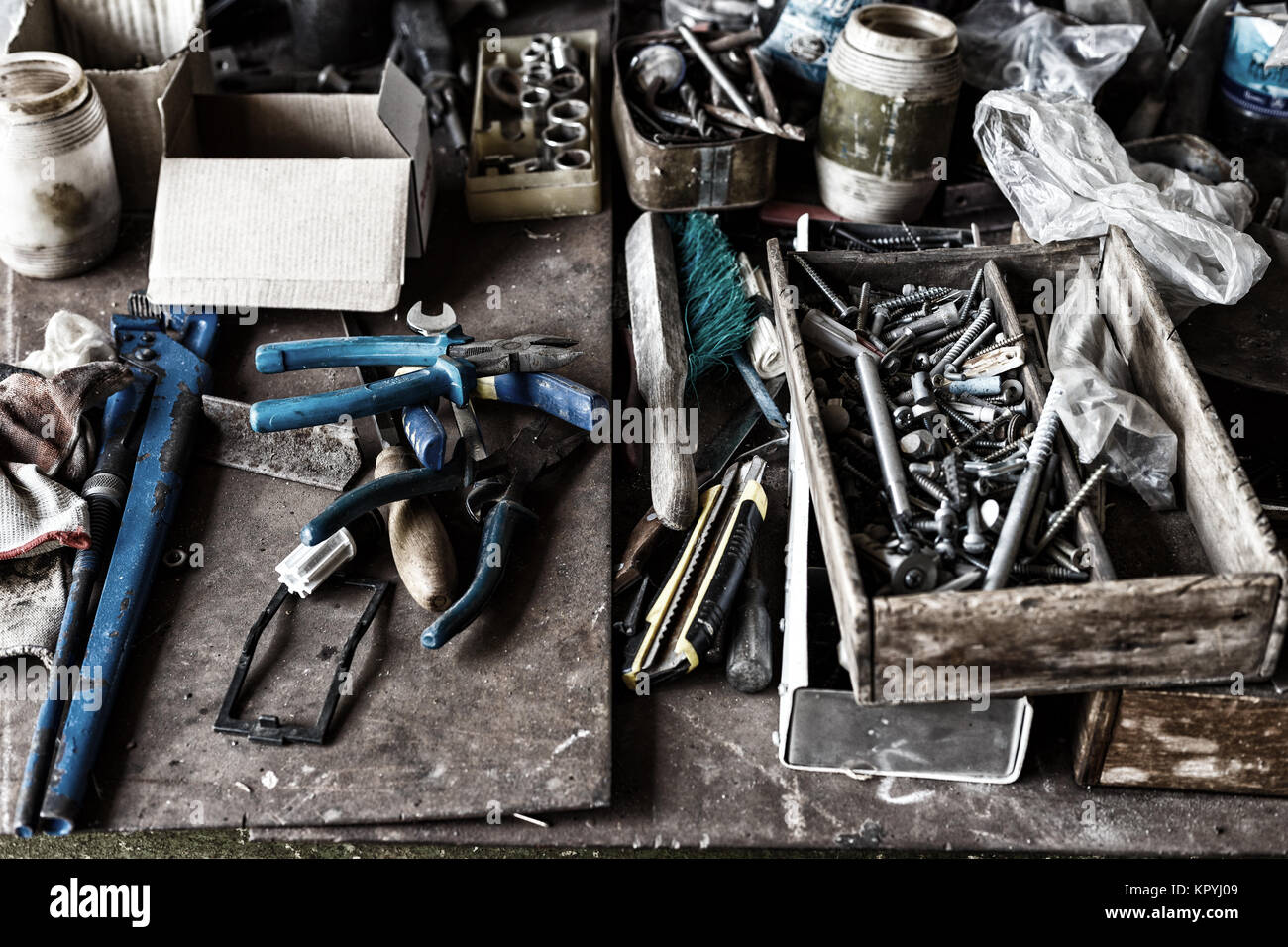 scattered work tool on the table Stock Photo - Alamy