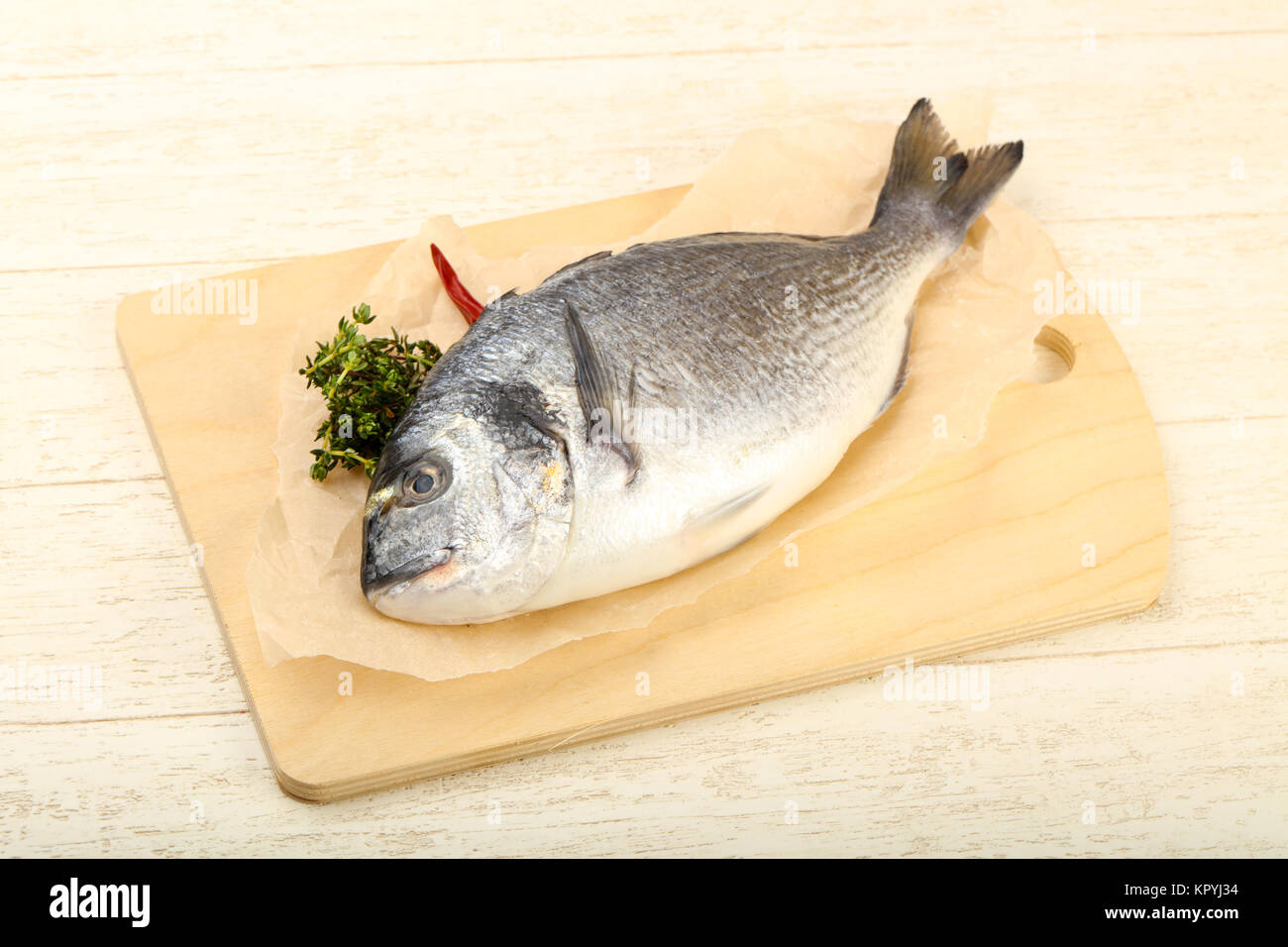 raw dorada fish - ready for cooking Stock Photo - Alamy