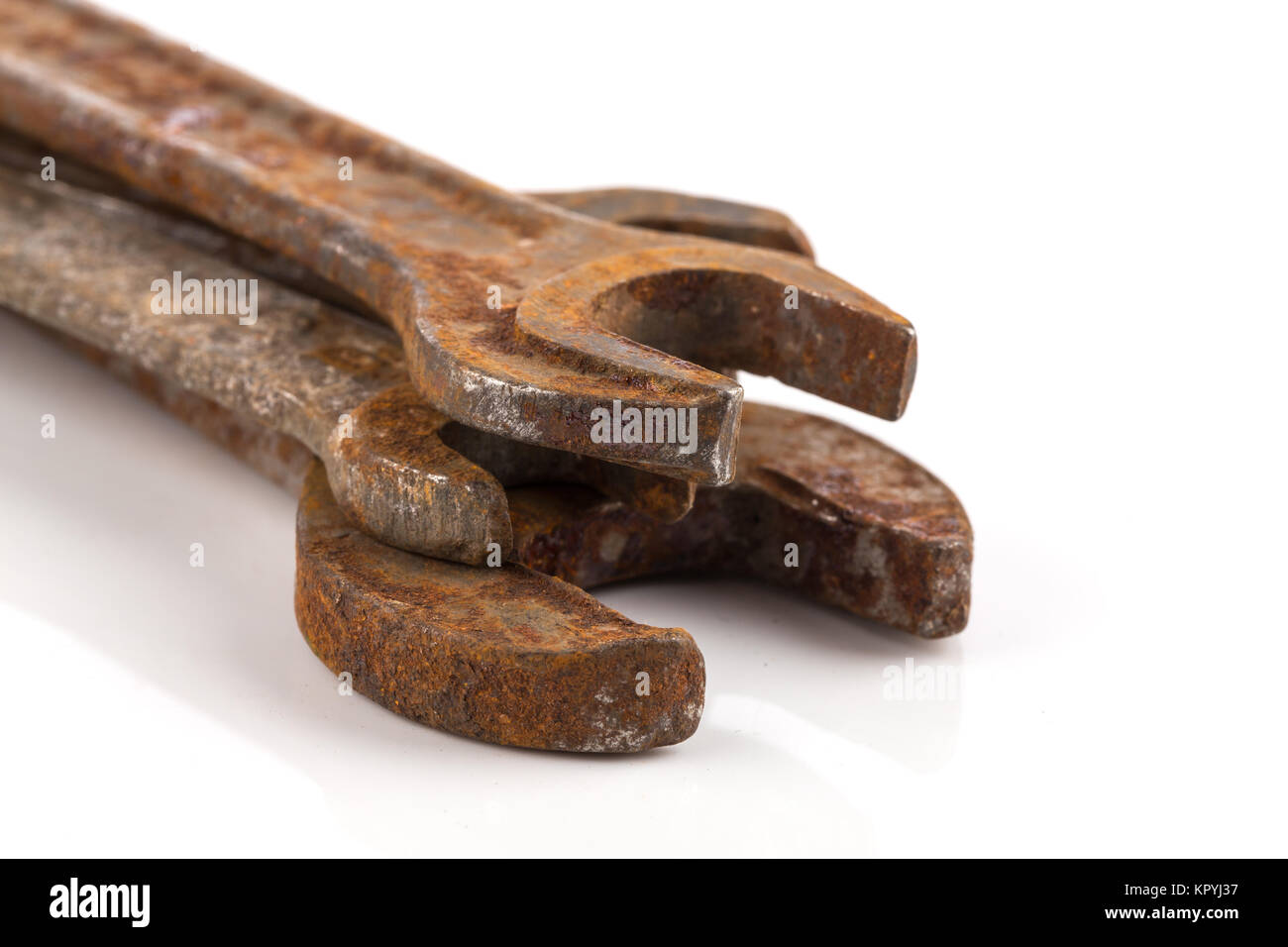 old rusty spanners isolated on white background Stock Photo - Alamy