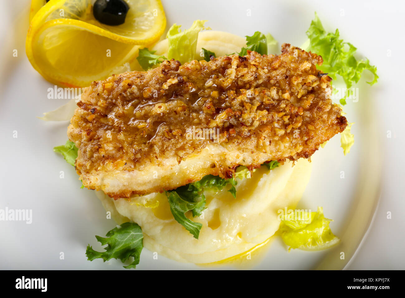 Baked Cod fish with mashed potato Stock Photo - Alamy