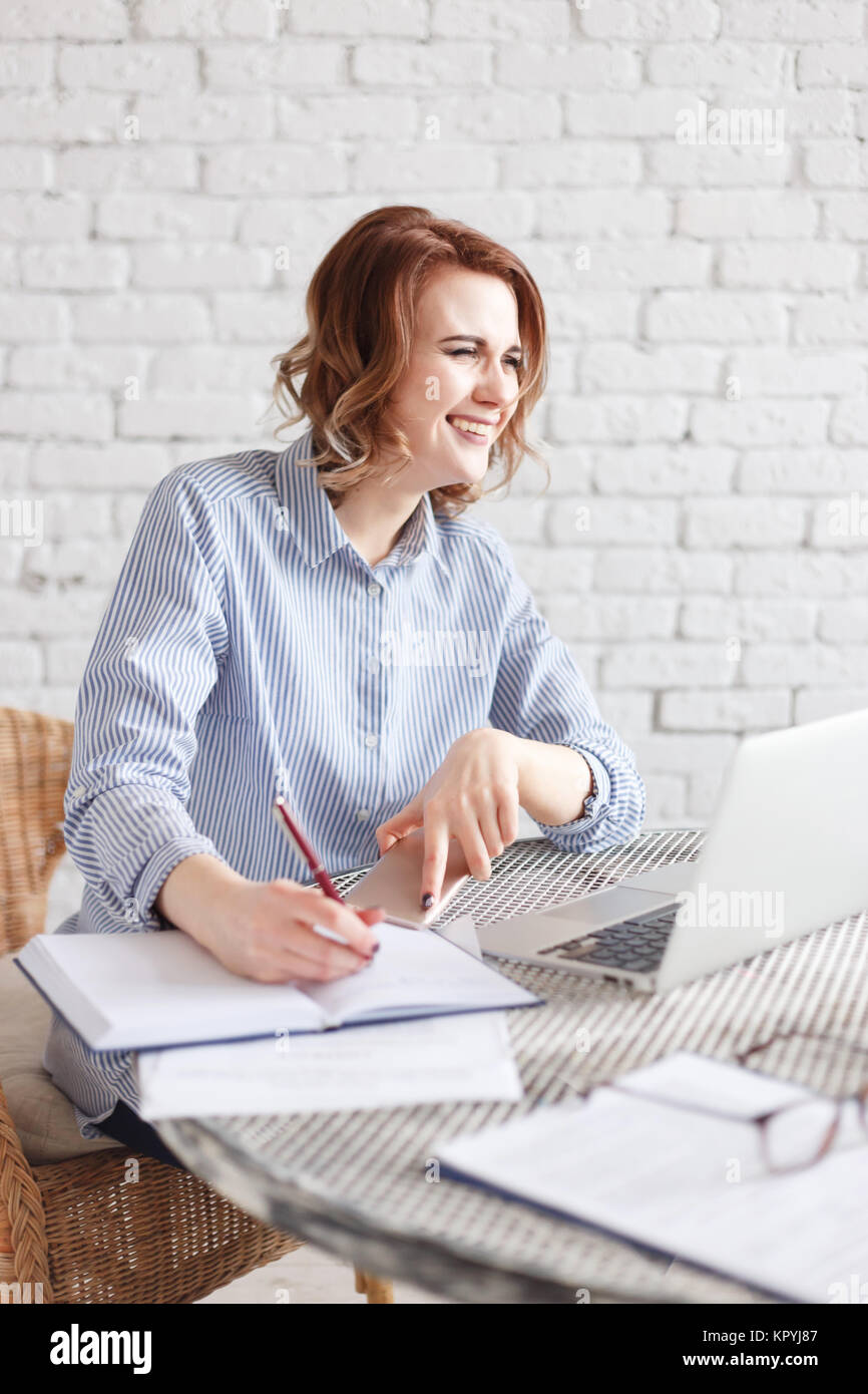Modern happy business woman in the office Stock Photo - Alamy