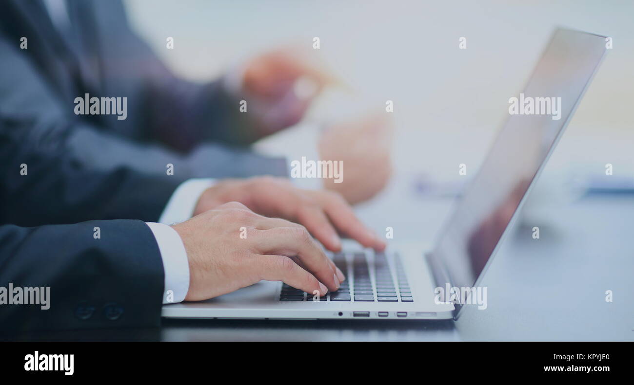 close up hands multitasking man using laptop connecting wifi Stock ...