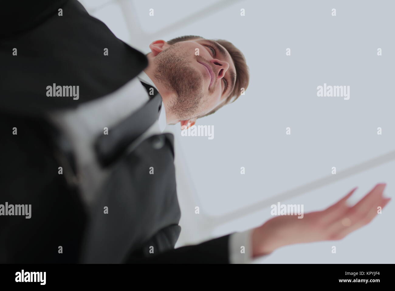 Portrait of a young handsome businessman offering handshake Stock Photo ...