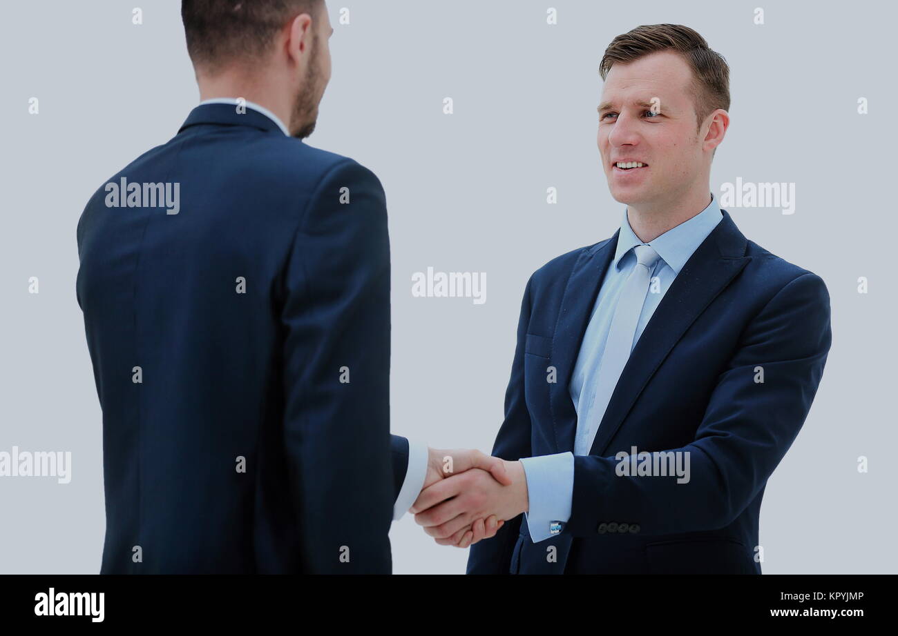 Two business executives shaking hands Stock Photo - Alamy