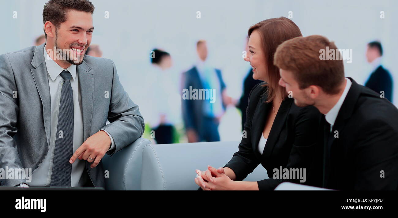 Happy business people talking on meeting at office Stock Photo - Alamy