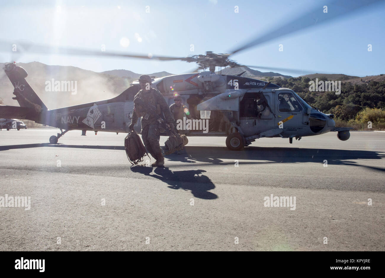 U.S. Marines with the Advanced Infantry Unit Leaders Course exit a SH ...