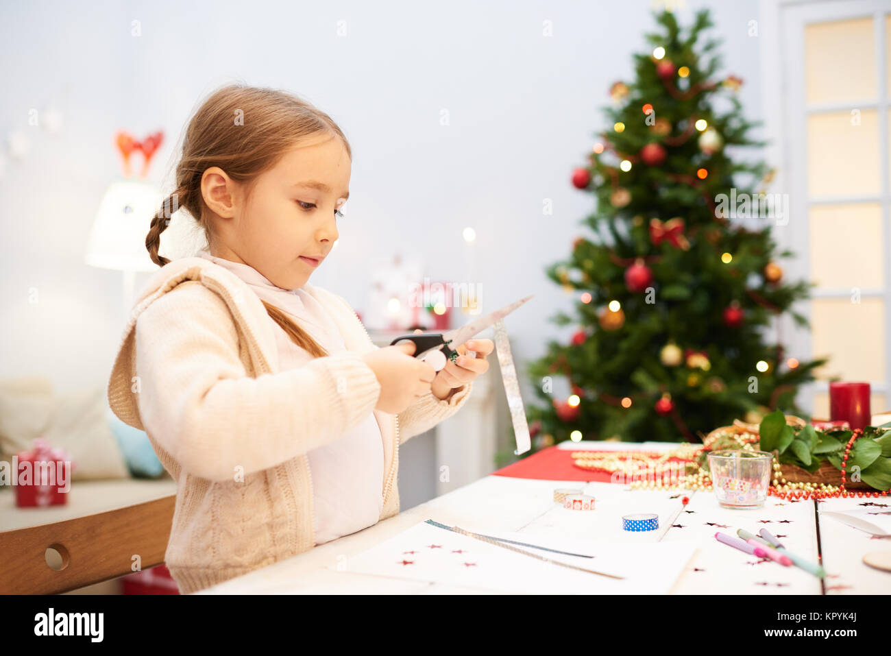 Child making card for present hi-res stock photography and images - Alamy