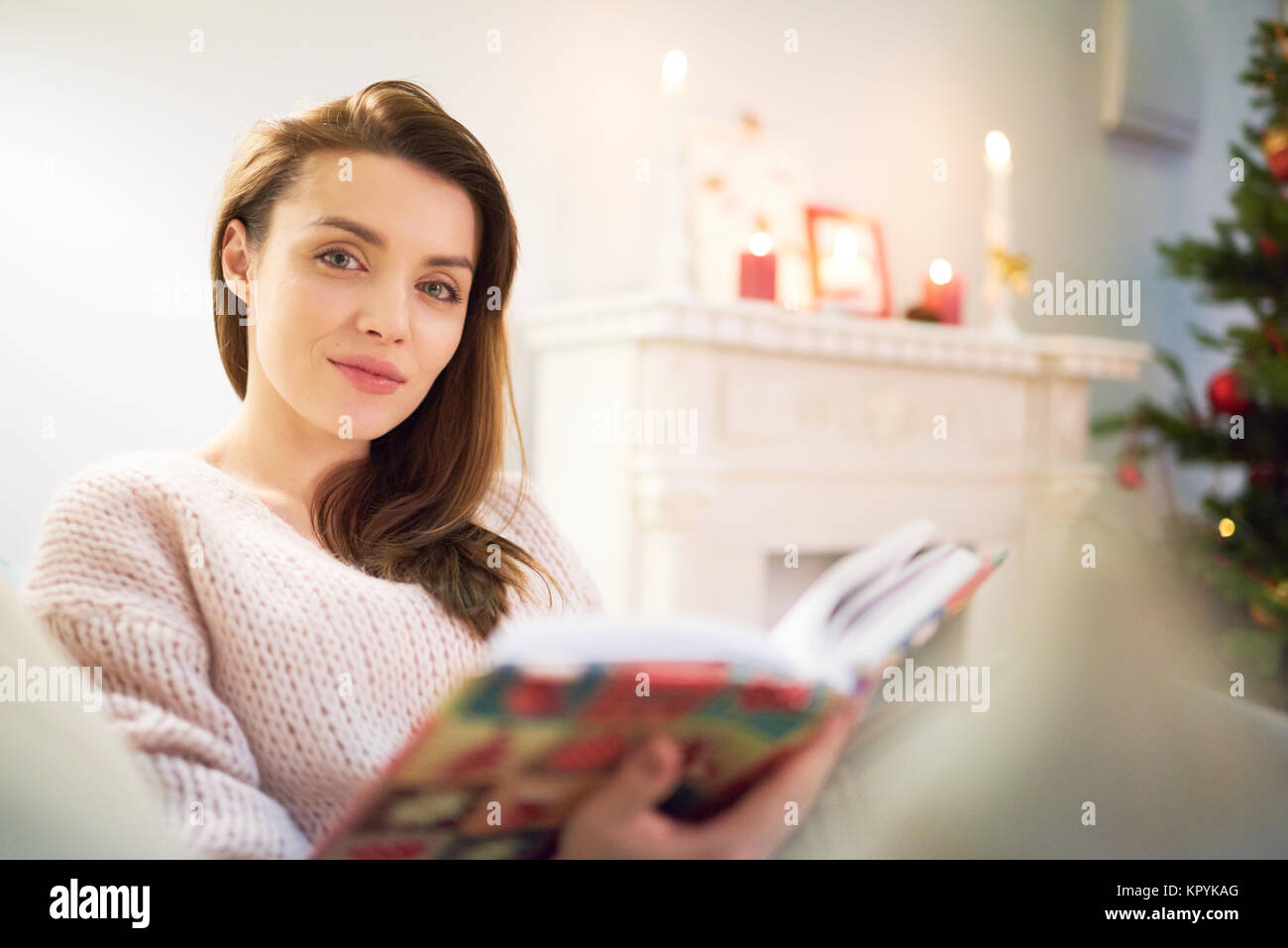 Woman young sitting sofa hi-res stock photography and images - Alamy