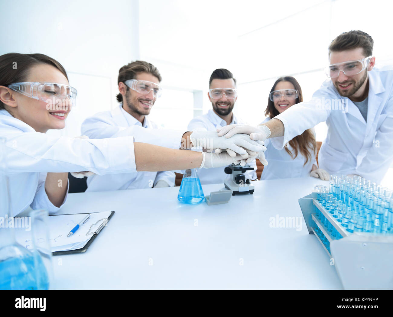creative team of young scientists Stock Photo - Alamy