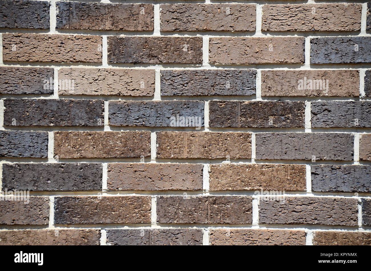 Rough multicolour brick wall texture hi-res stock photography and ...