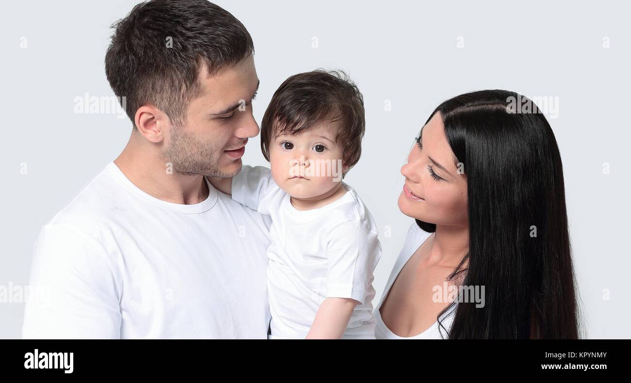 Happy family with newborn baby on a white background Stock Photo - Alamy