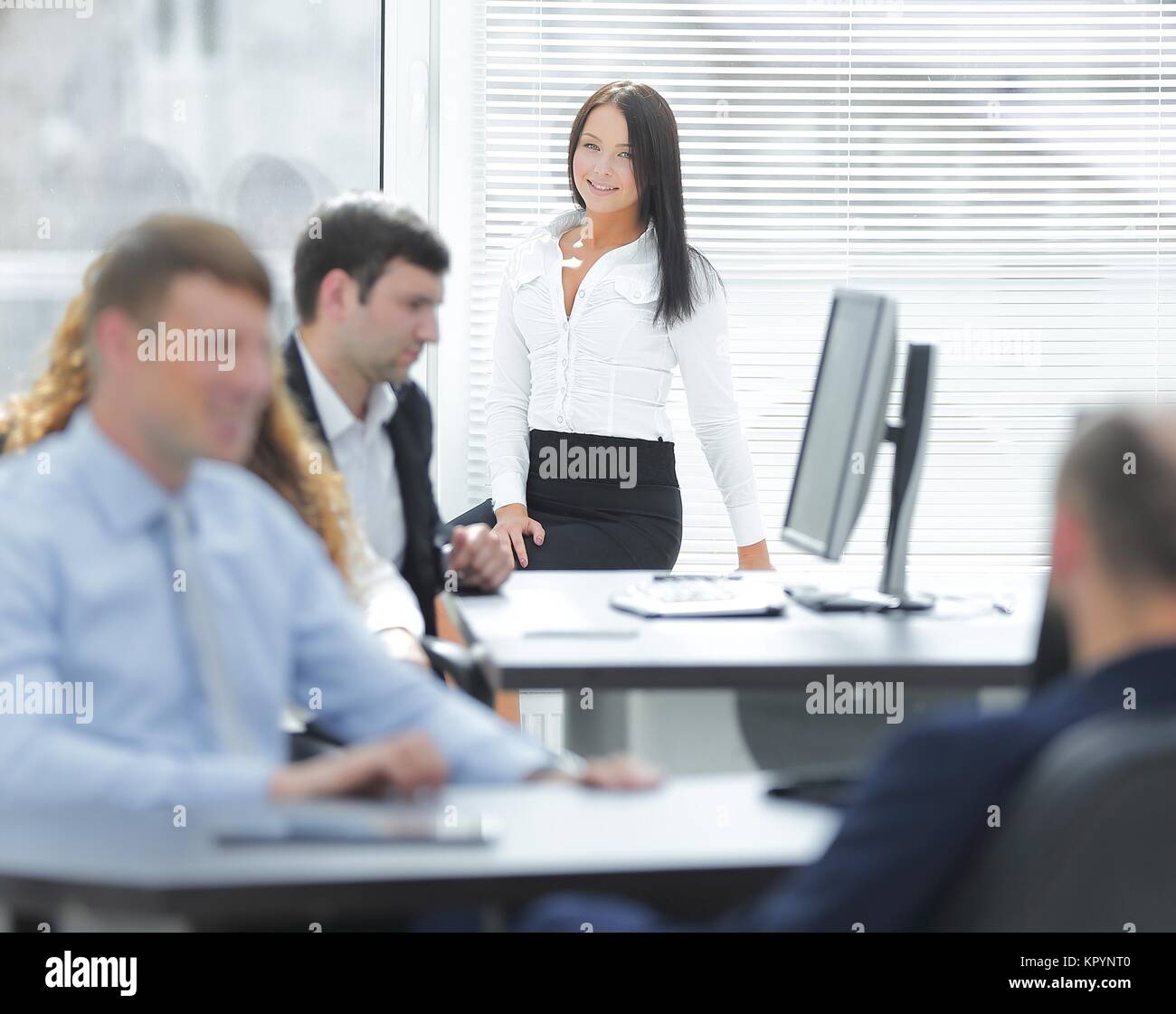 Manager and business team workplace Stock Photo - Alamy