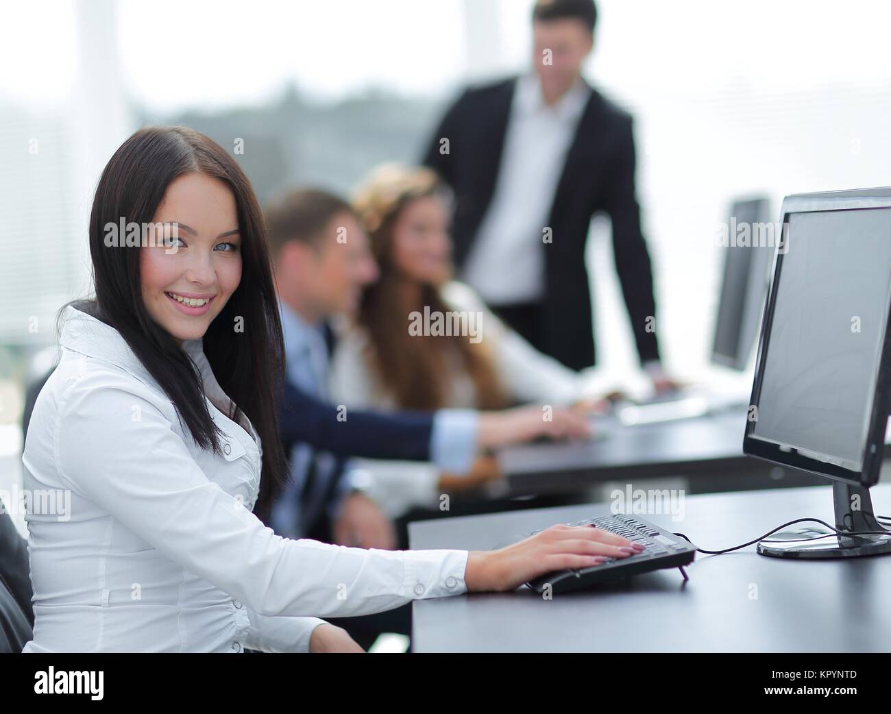 business woman on the background of the office Stock Photo - Alamy