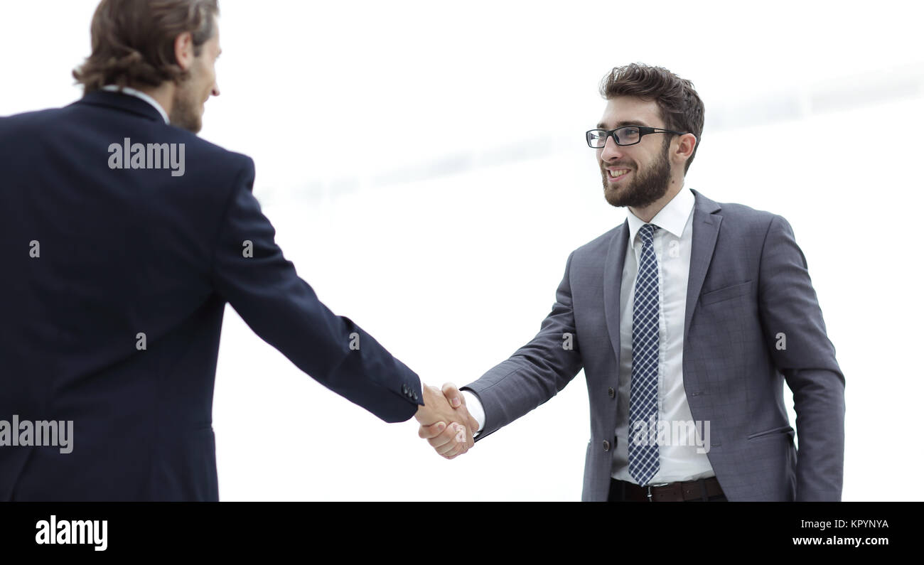 welcome and handshake of business partners Stock Photo - Alamy