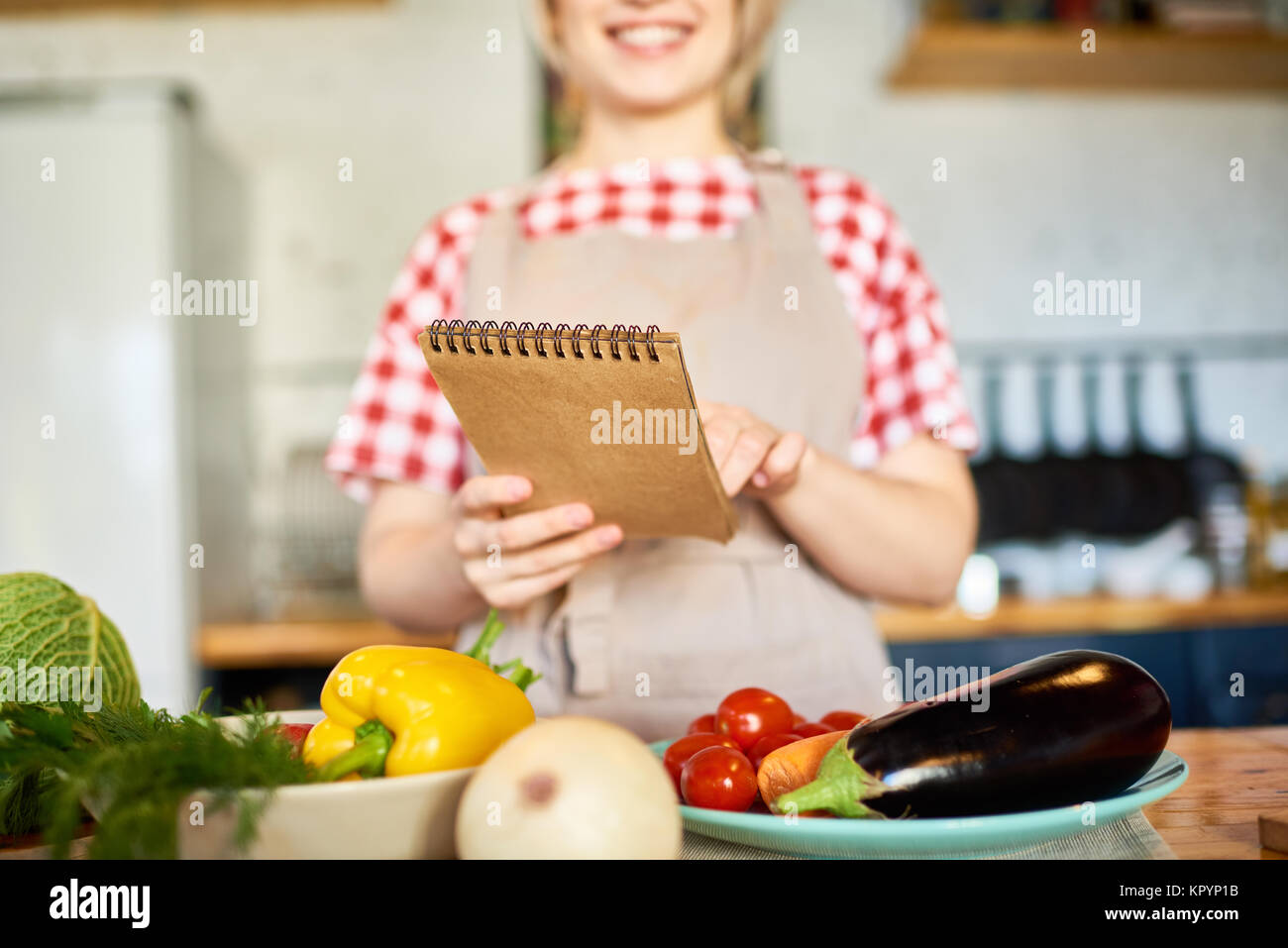 Young Woman Reading Recipe Stock Photo - Alamy