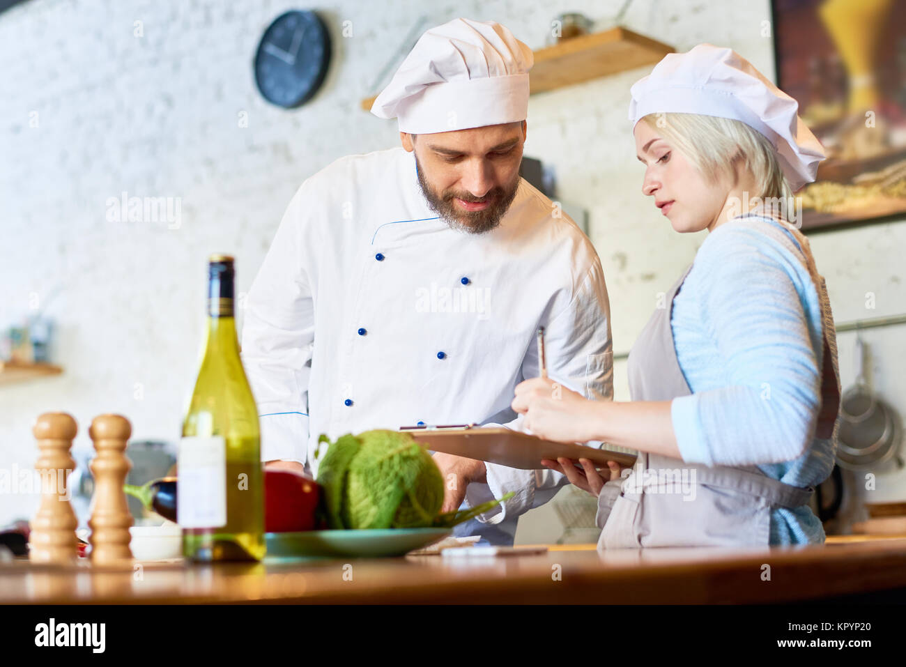 Chef Working in Cafe Kitchen Stock Photo - Alamy