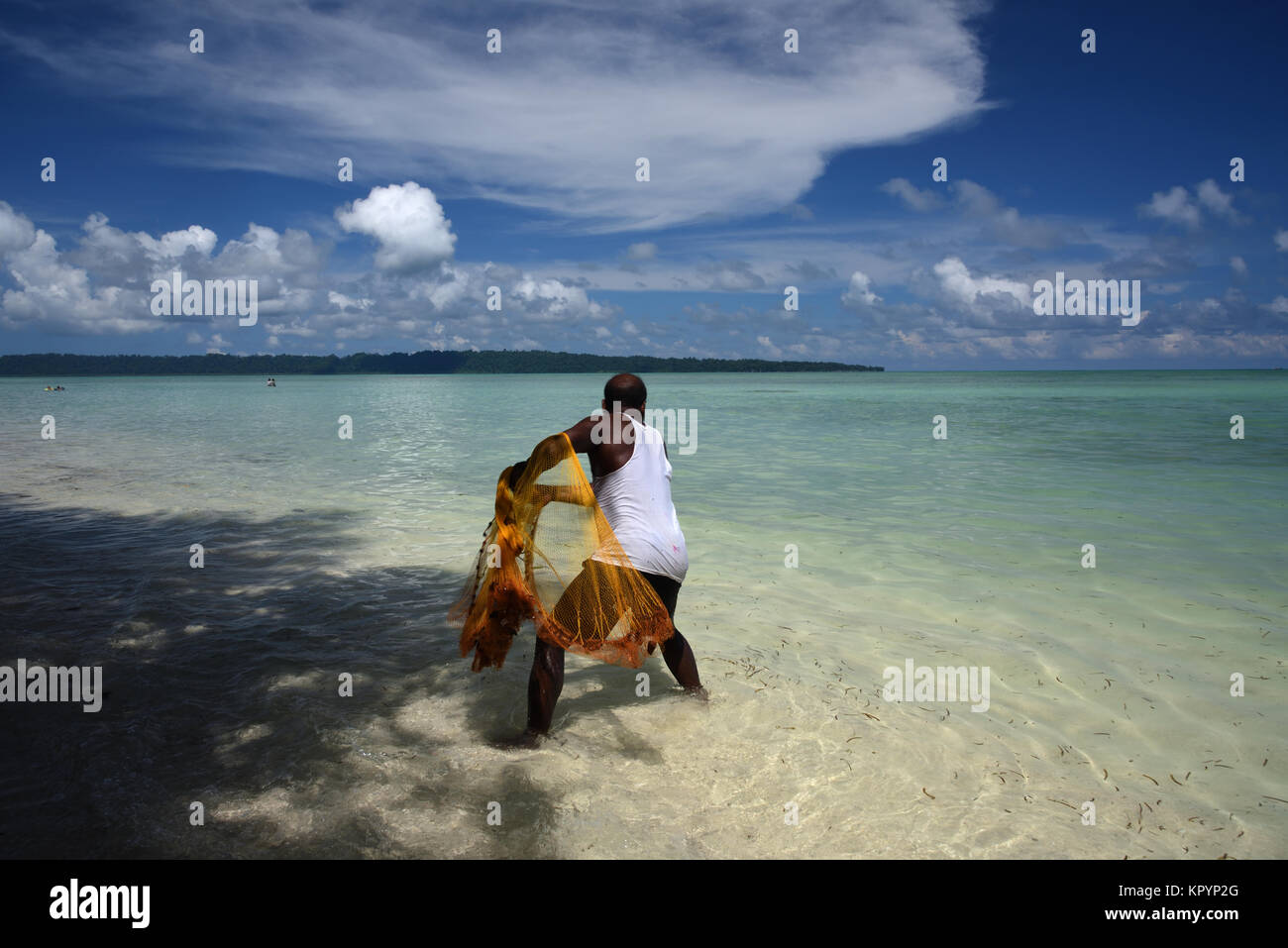 A Fisherman fishing in the Andaman Islands Stock Photo - Alamy