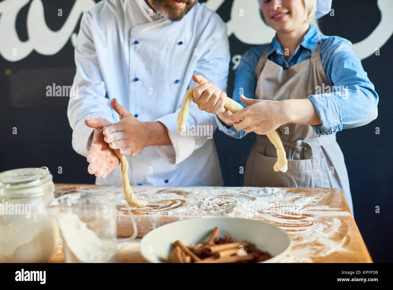 Two Bakers Making Pastry in Cafe Stock Photo - Alamy