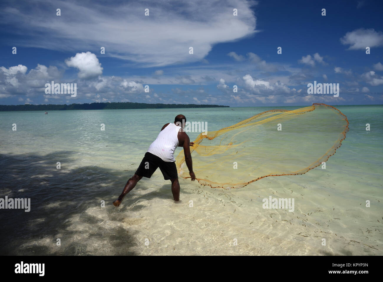 A Fisherman fishing in the Andaman Islands Stock Photo - Alamy