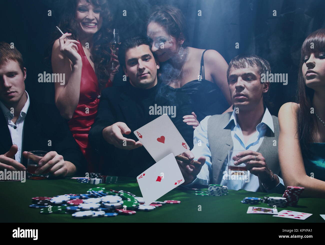 People around poker table hi-res stock photography and images - Alamy