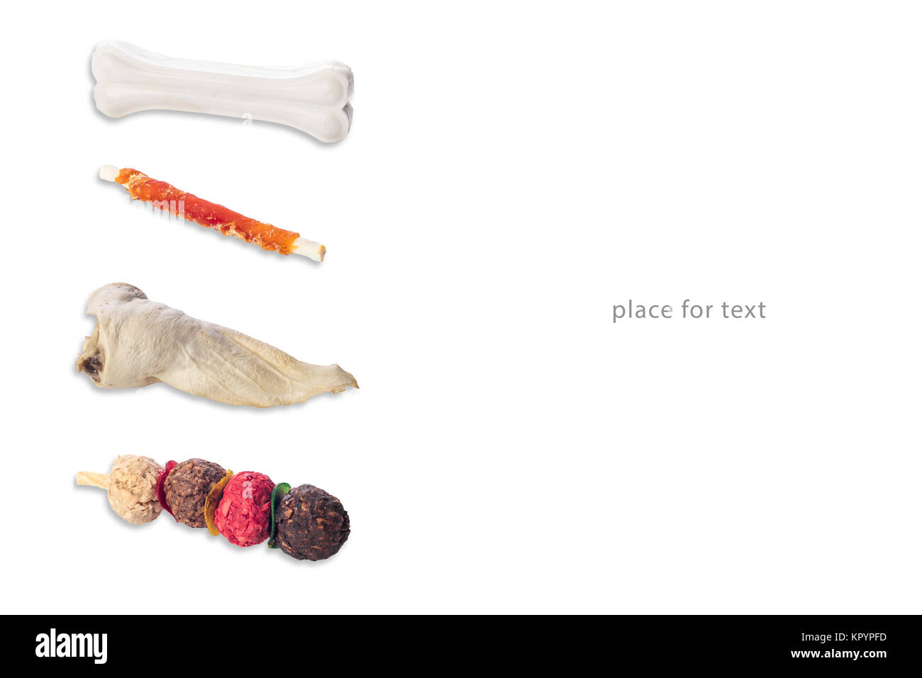 Nutritious pet food on a white background with shadow: bone, bone with ...